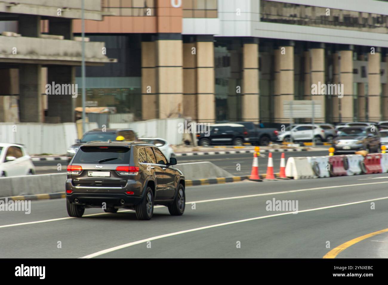 Jeep Grand Cherokee on the highway in Sharjah City, United Arab ...