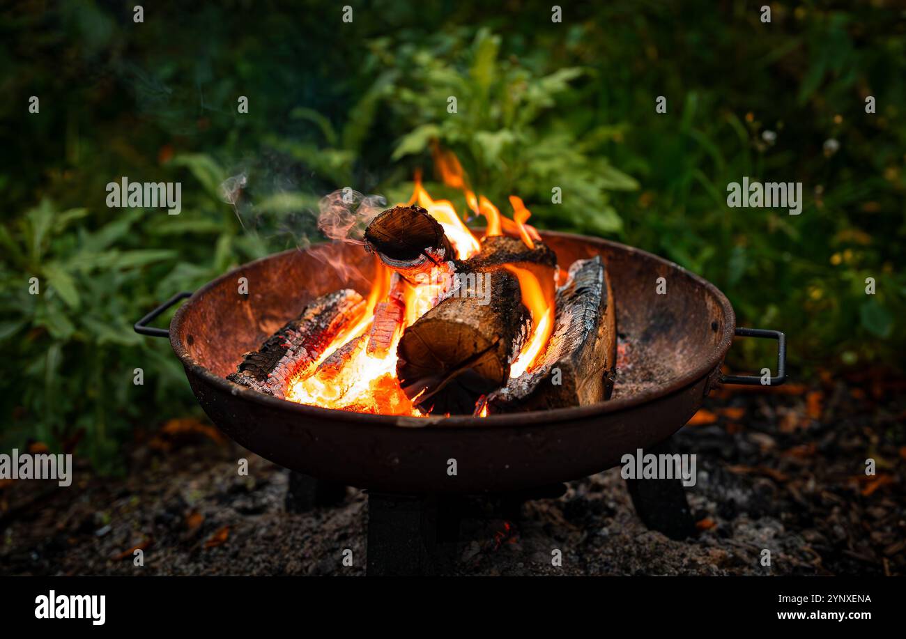 Orange fire burns in grill hi-res stock photography and images - Alamy