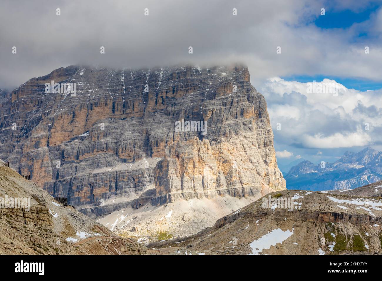 Dolomites mountains nasty weather in autumn with dark cloudy sky before ...
