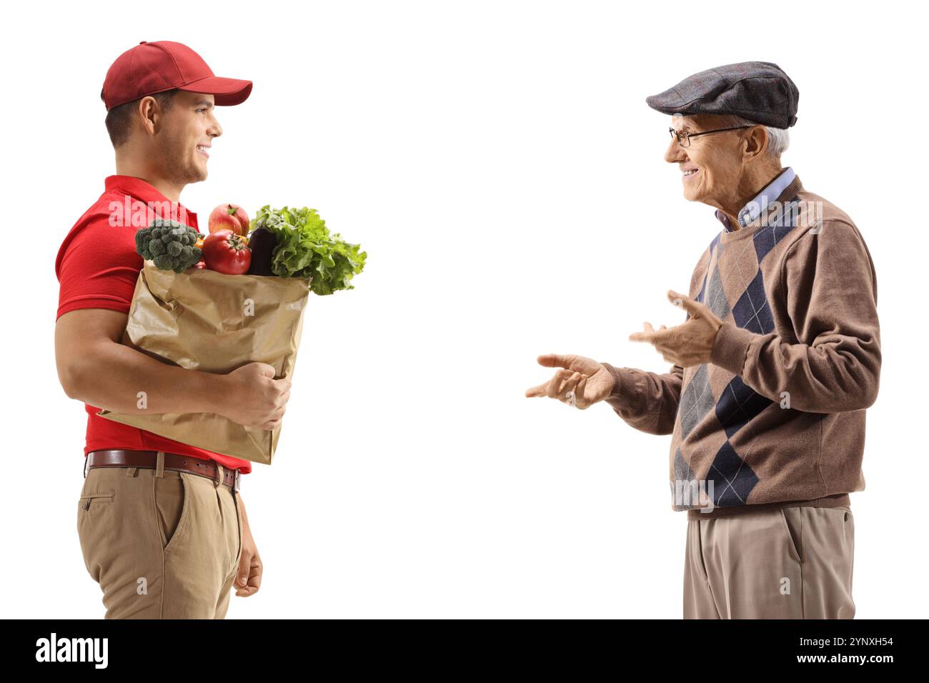 Elderly male customer talking to a grocery delivery man isolated on ...