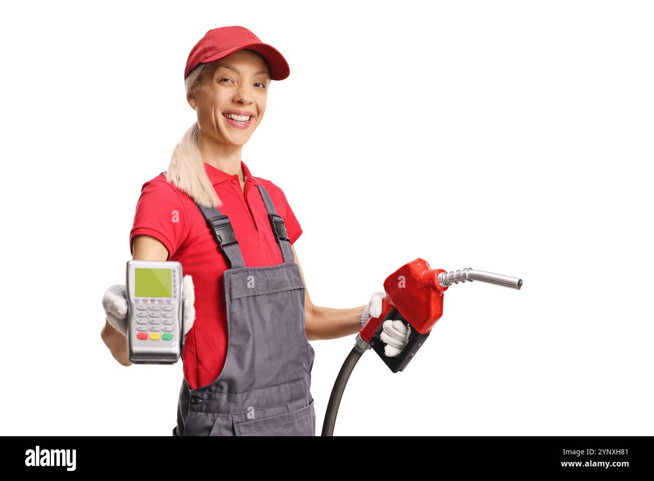 Female gas station worker holding a refuel gun and a credit card ...