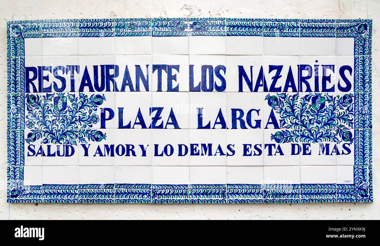 Granada, Spain- October 27, 2024: A restaurant sign written with ...