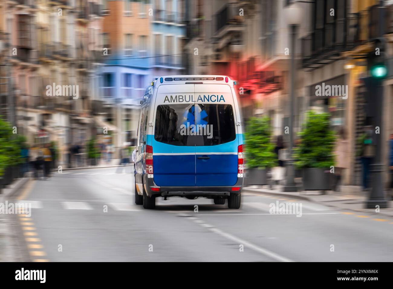 Closeup and back rear view of emergency ambulance car in the street, in ...