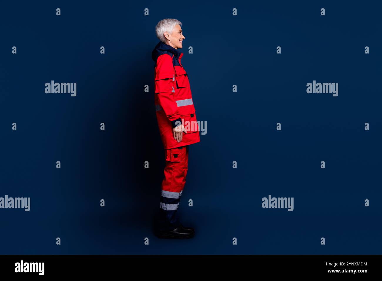 Full body photo of nice senior woman stand profile wear uniform ...