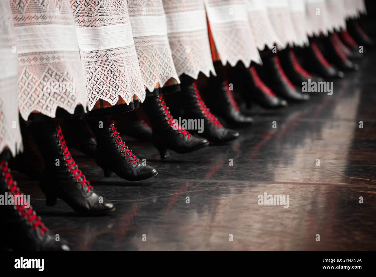 Detail of dancer's legs with black shoe and red laces Stock Photo - Alamy