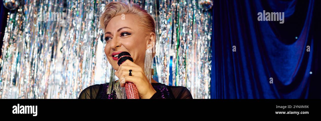 A dazzling drag queen performs with striking makeup at a festive ...
