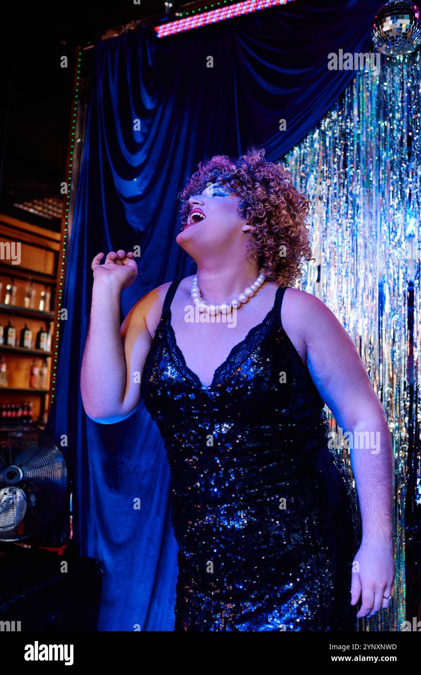 Dazzling drag performer showcases extravagant makeup and style during a ...