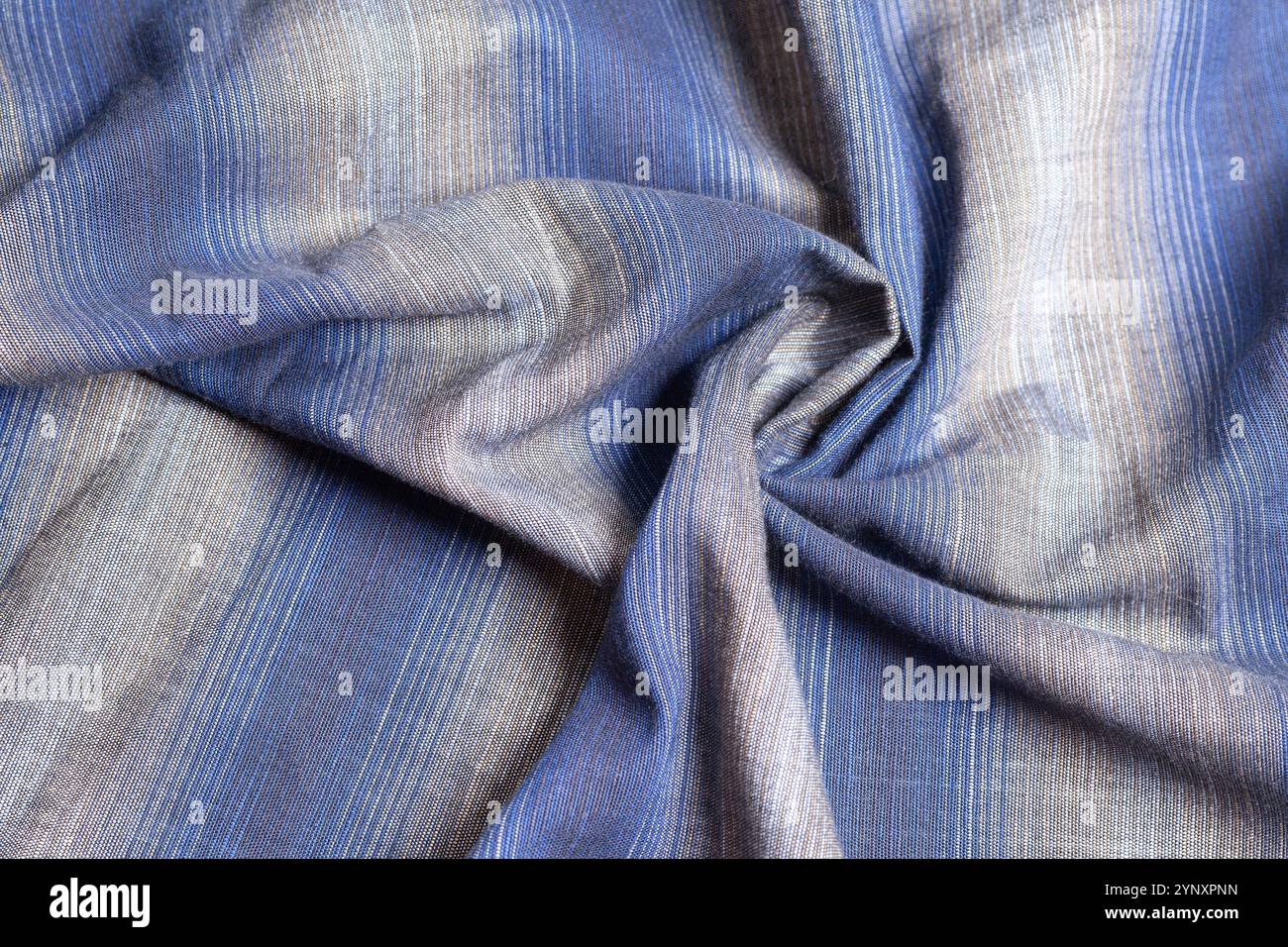 Gray blue fabric cloth texture with spiral folds Stock Photo - Alamy