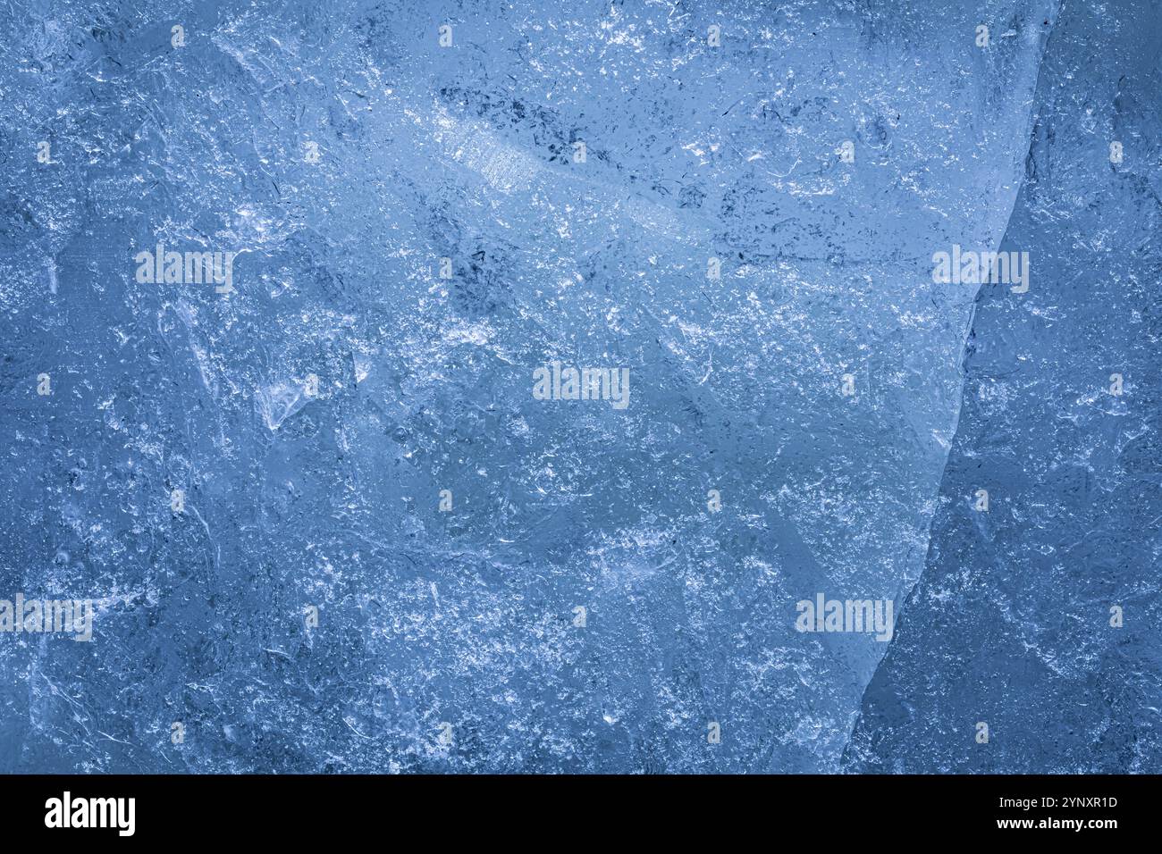 Detailed blue ice texture showing intricate pattern with cracks of ...