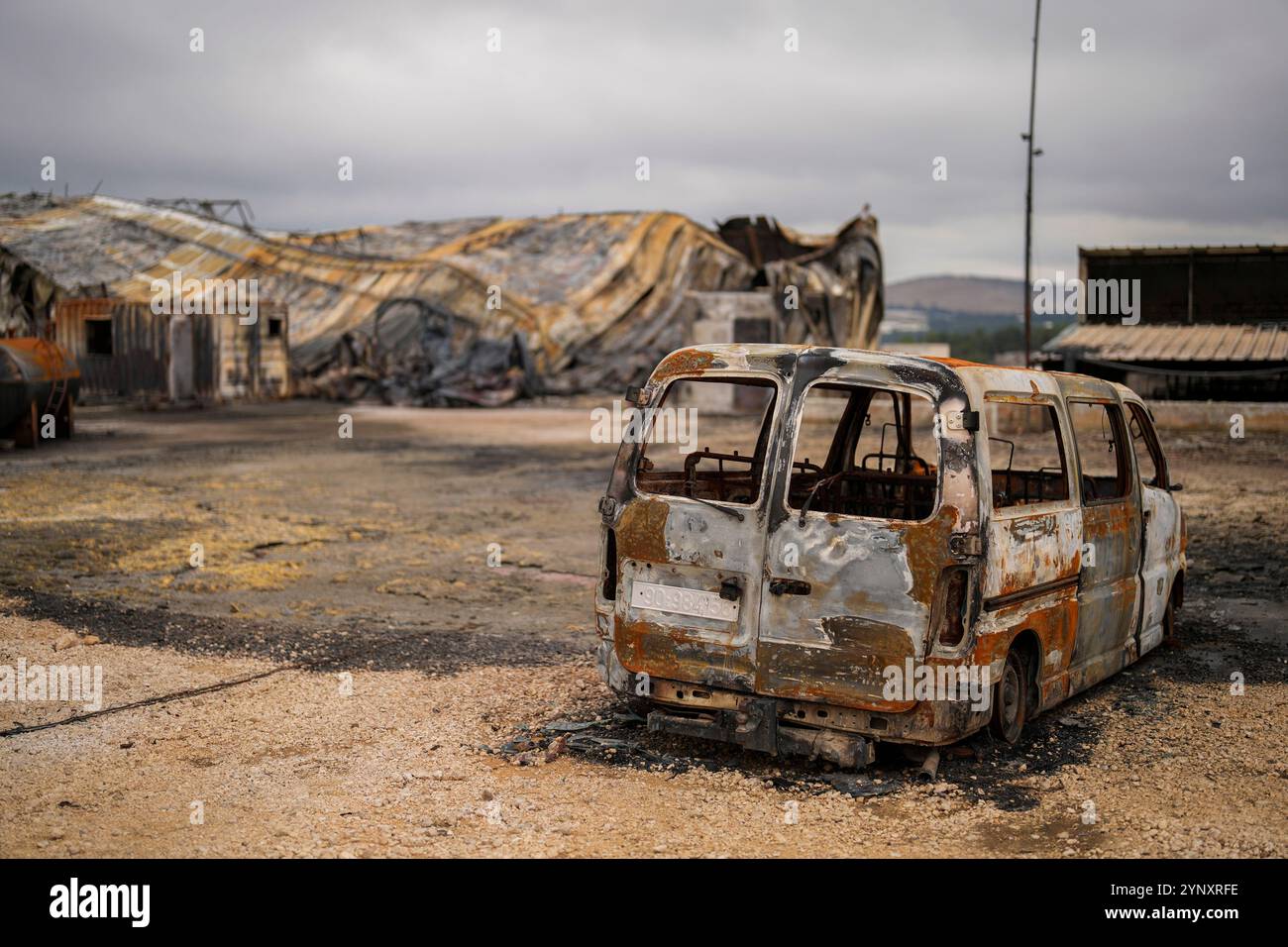 Damage is seen in an animal farm hit by a rocket fired from Lebanon in ...