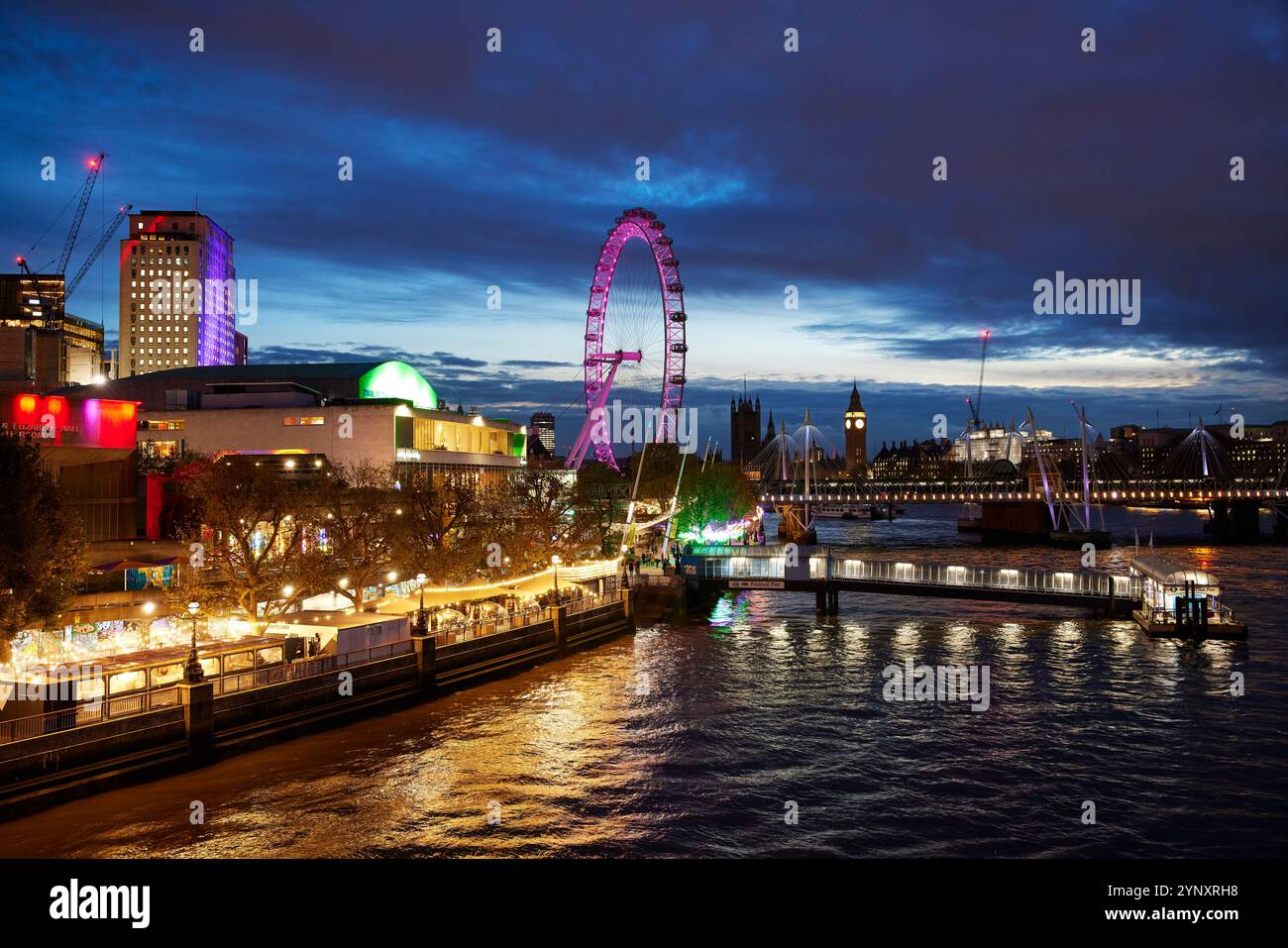 View from Waterloo Bridge at dusk of the London Eye, Hungerford and ...