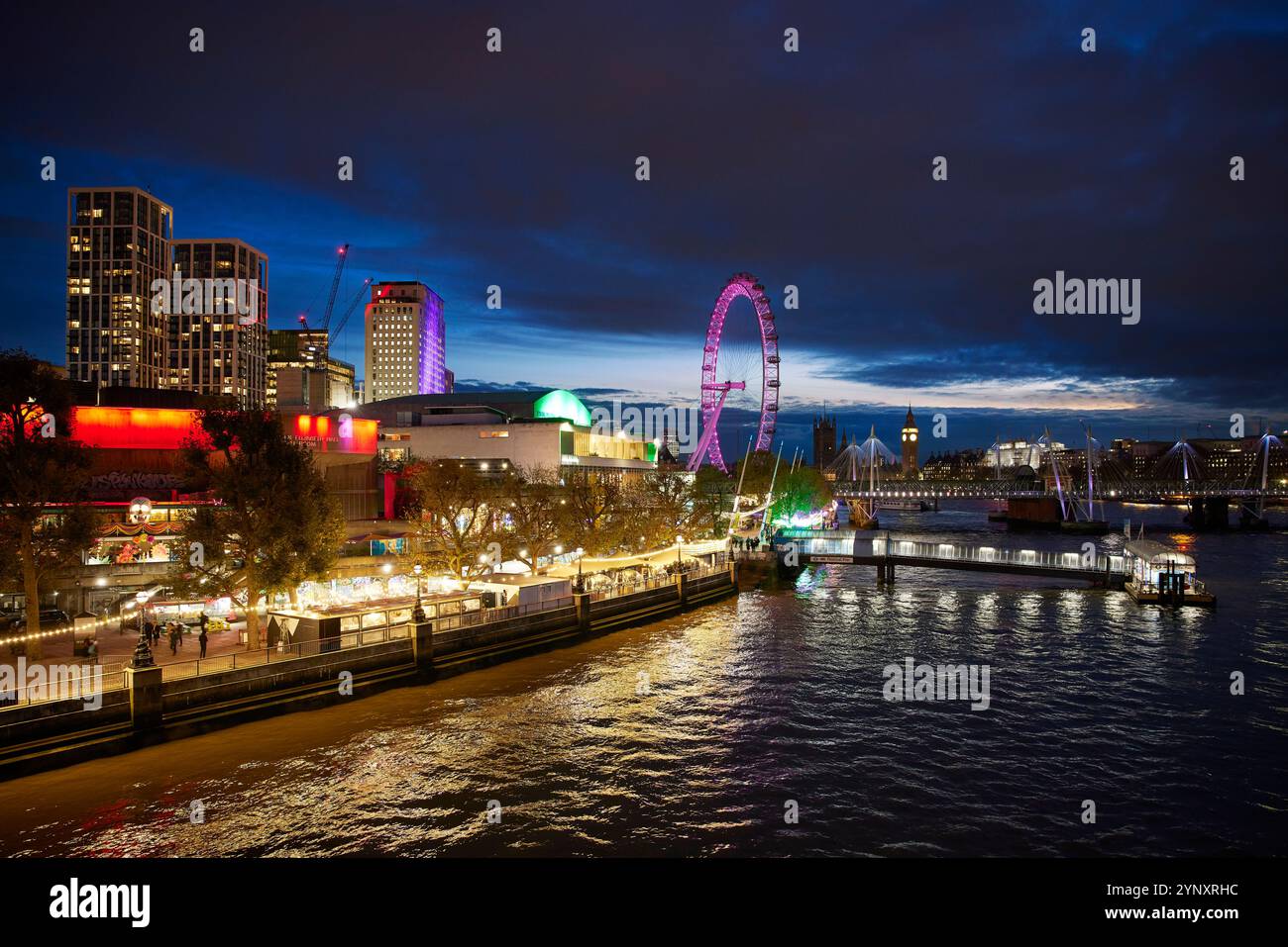 View from Waterloo Bridge at dusk of the London Eye, Hungerford and ...
