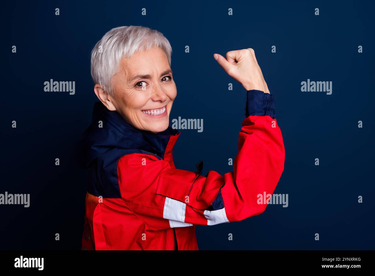 Photo of lovely retired lady flexing muscles strong wear uniform ...