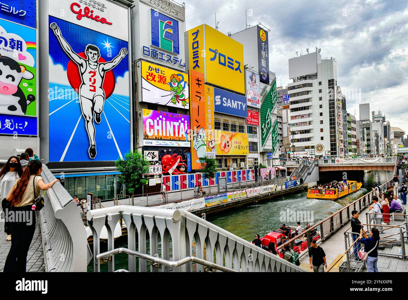 Osaka, Japan-Oct24 ,2024 : Shopping area at Dotonbori the famous Glico Running Man neon show the ...