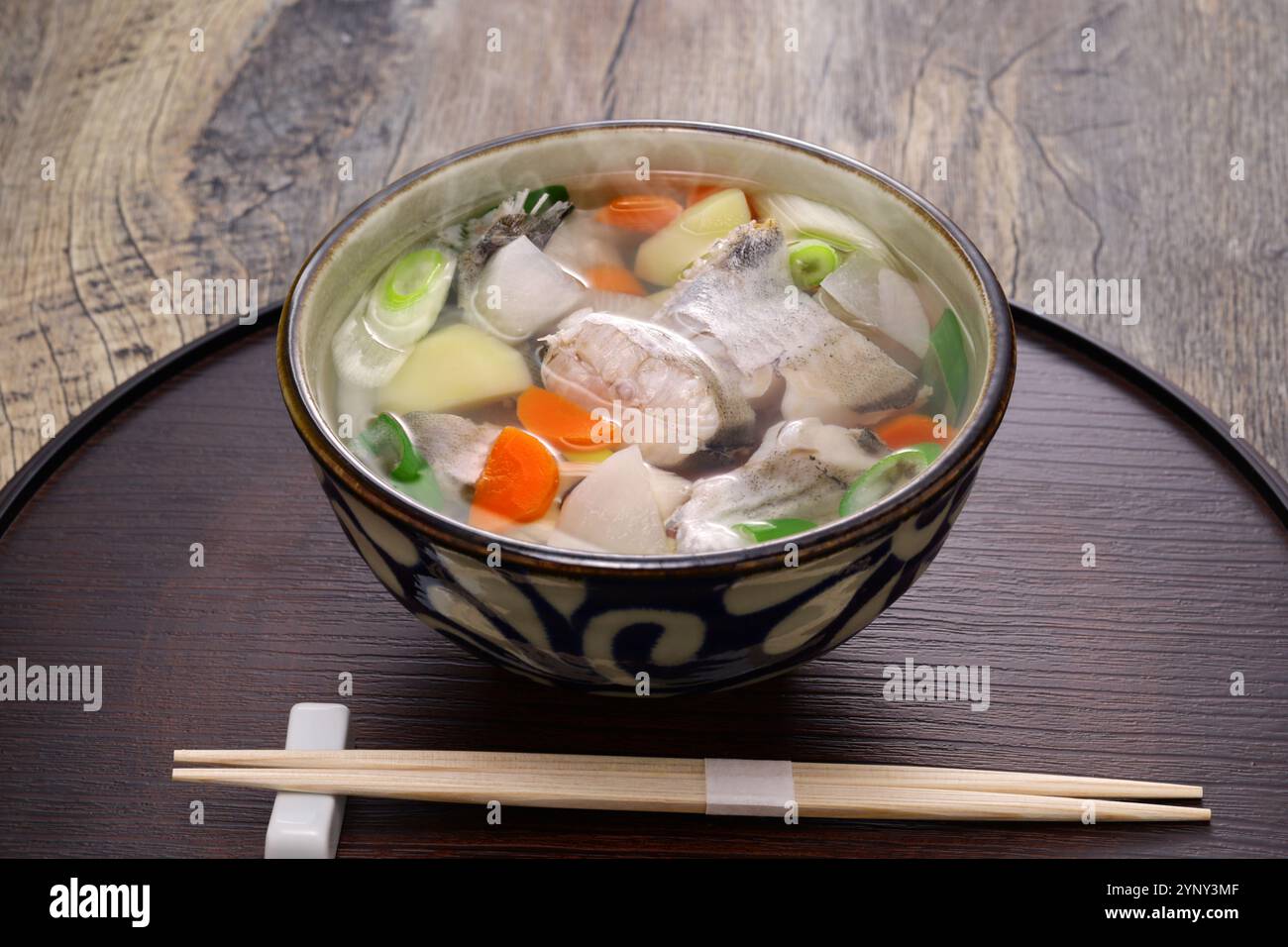 Sanpei soup ( hot pot dish with pollock and root vegetables ), Japanese ...