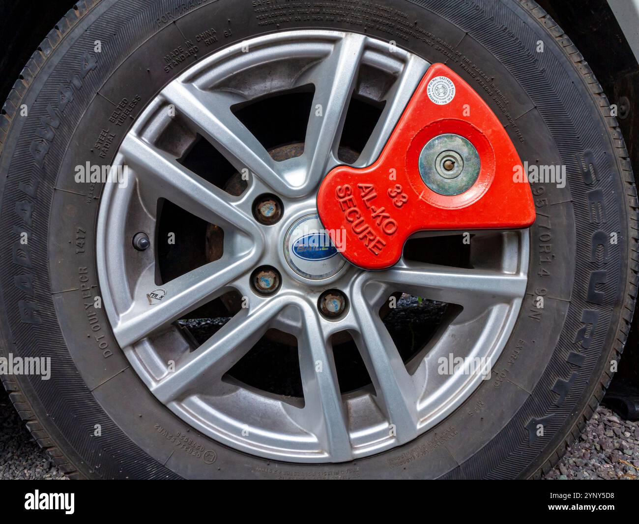 Close up view of an Al-Ko sccure wheel lock attached to a touring ...
