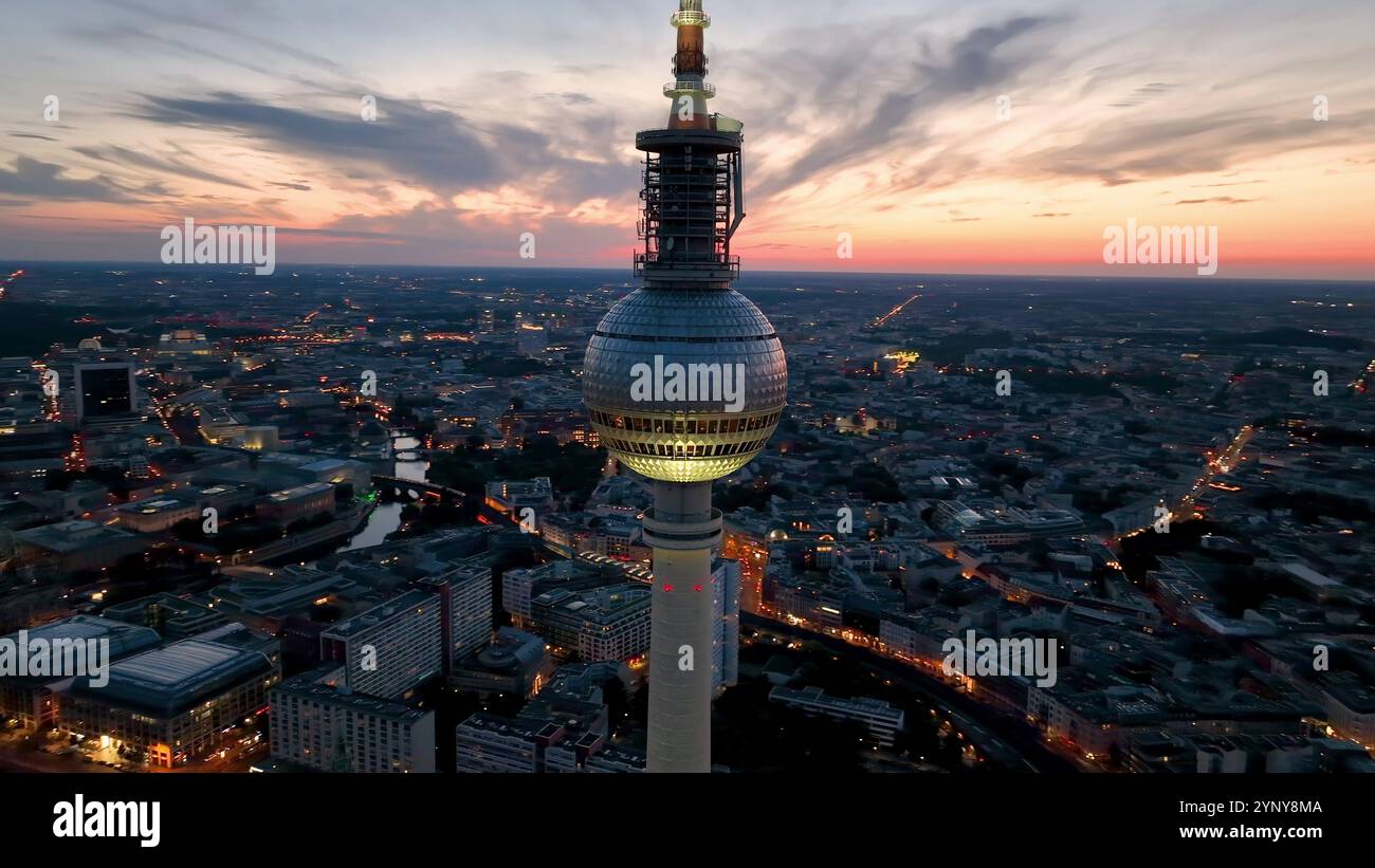 This aerial video showcases a vibrant cityscape with a majestic tower ...