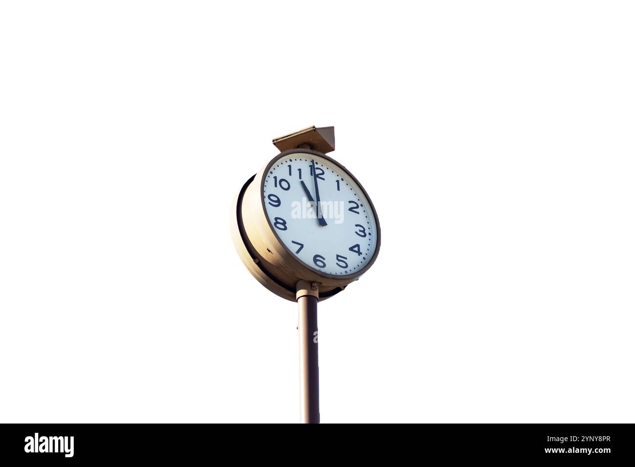 A clock mounted on a tall pole indicates the current time as precisely ...