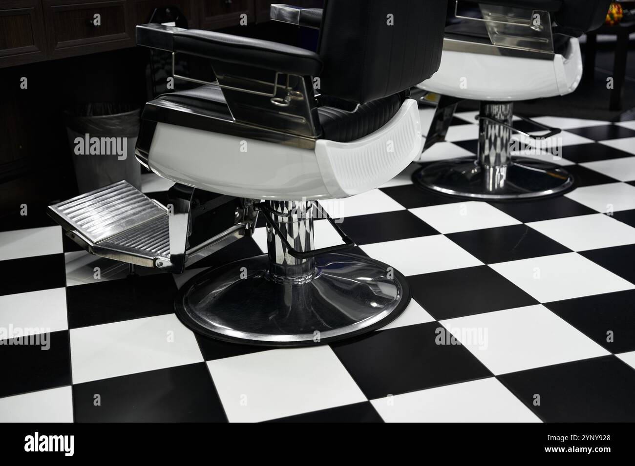 Classic barber shop interior featuring black and white checkerboard ...