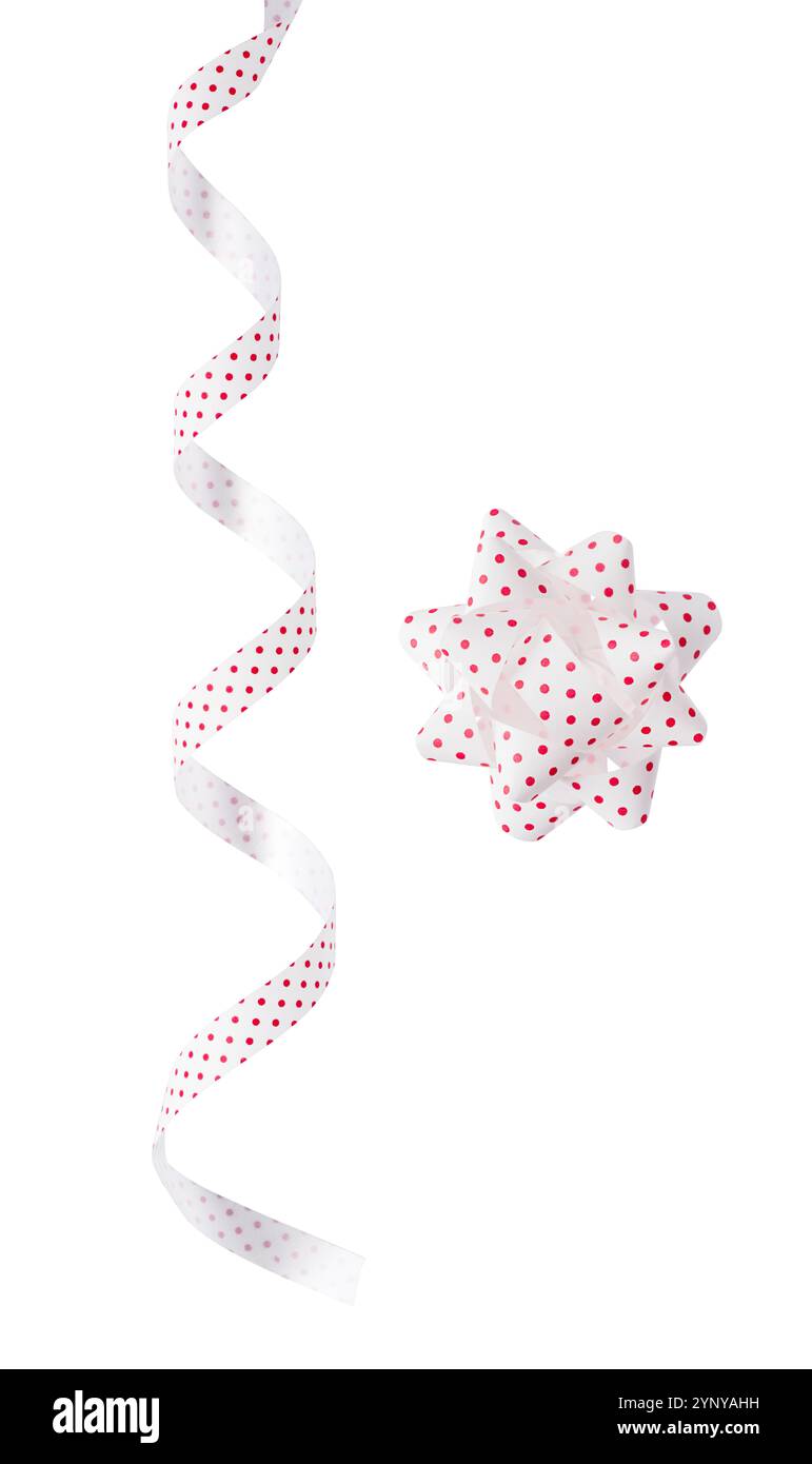 Tied fluffy bow and serpentine streamer for wrapping gifts isolated on ...