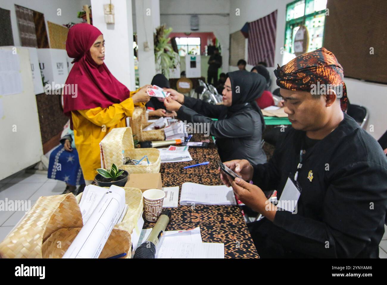 Cimahi, West Java, Indonesia. 27th Nov, 2024. An officer wearing ...