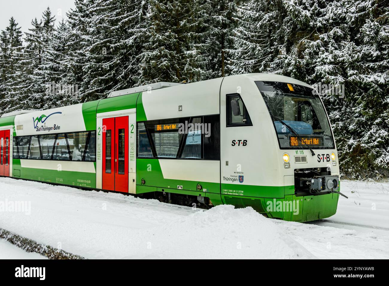 A winter hike to Rennsteig railway station in the snow-covered ...