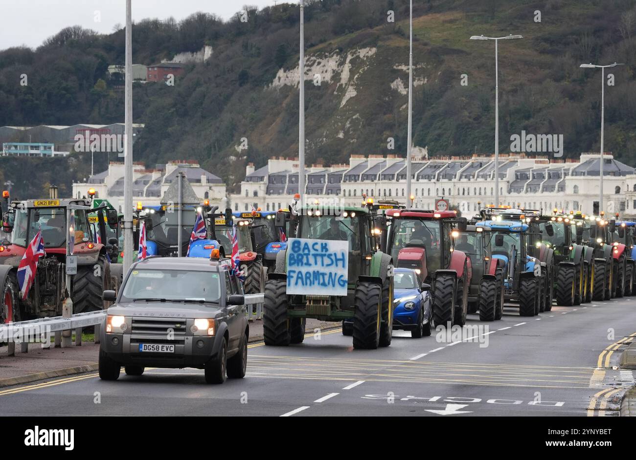 Farmers take part in a go-slow protest in Dover, Kent, to show their ...