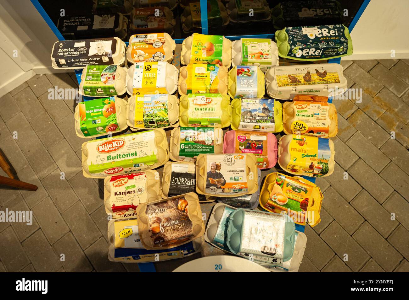 Large number of egg cartons with various inscriptions and coloured ...