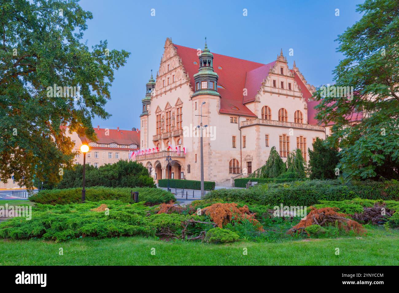 Facade of the historic building of Adam Mickiewicz University at dawn ...