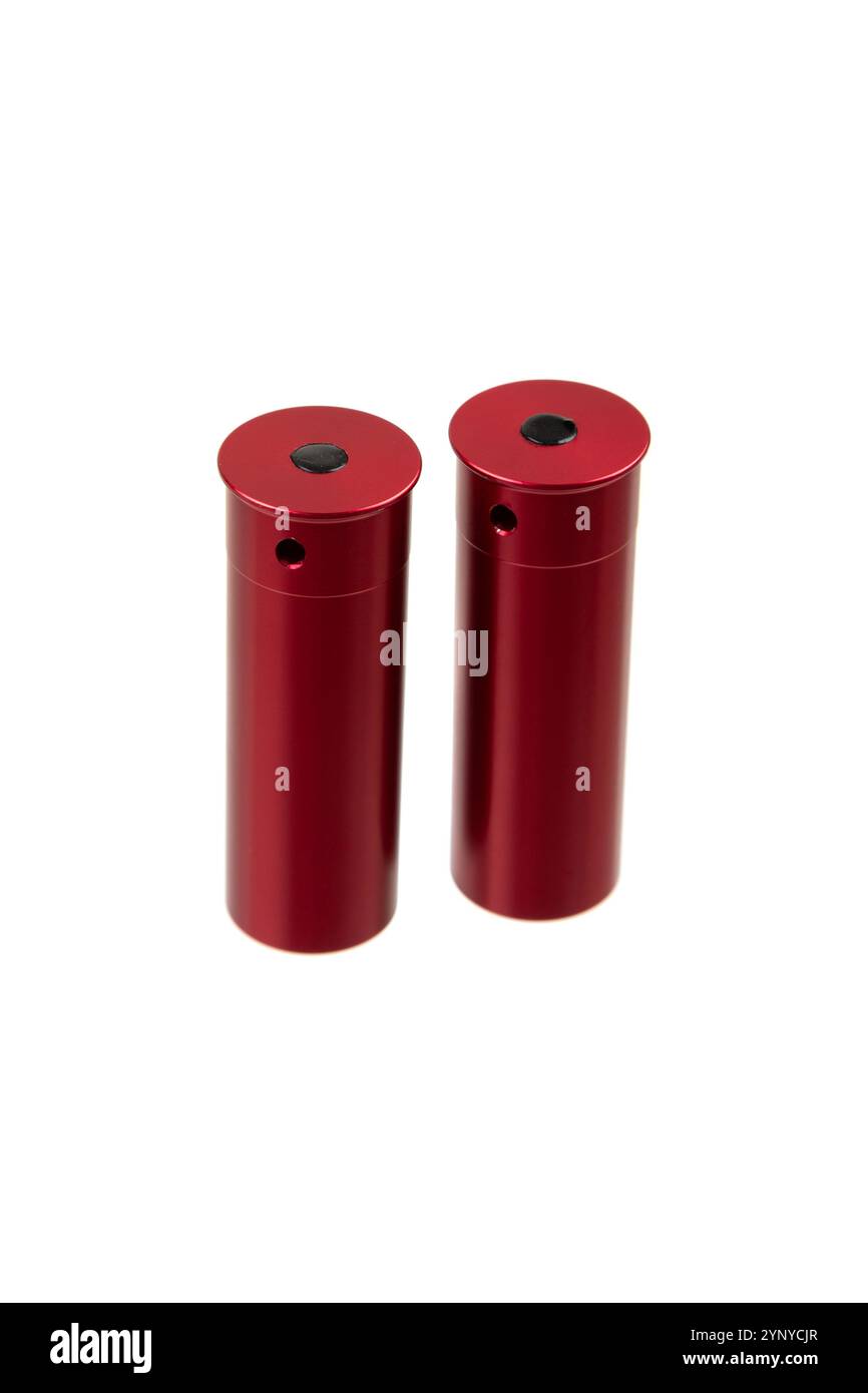 Two red 12-gauge dummy shotgun shells for safe dry firing, isolated on ...