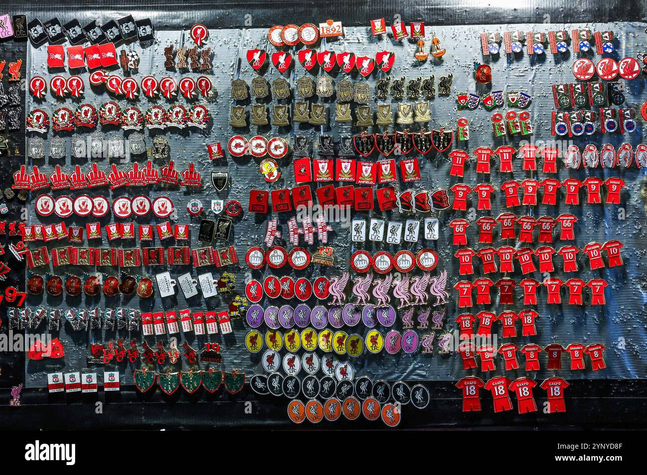Merch stands sell badges outside of Anfield prior to the UEFA Champions ...