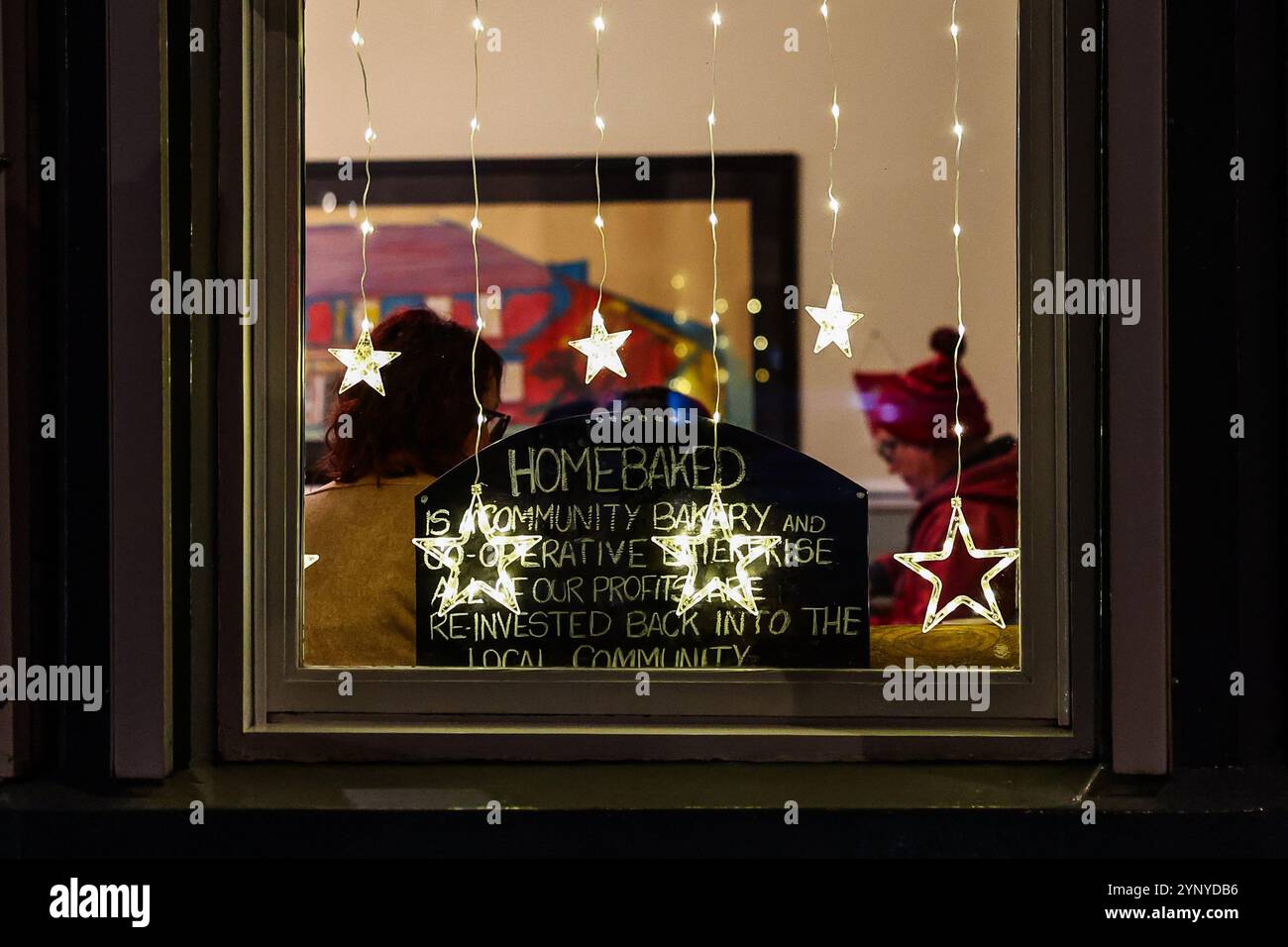 Fans eat at local food outlets outside of Anfield prior to the UEFA ...