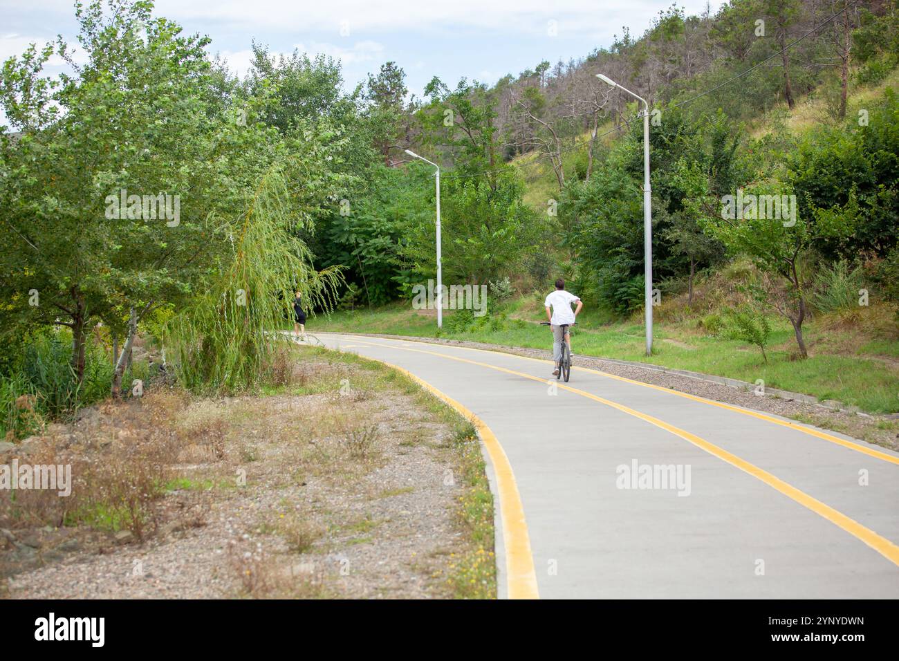 Bicycle and pedestrian path around Lake Lisi, Tbilisi Stock Photo - Alamy