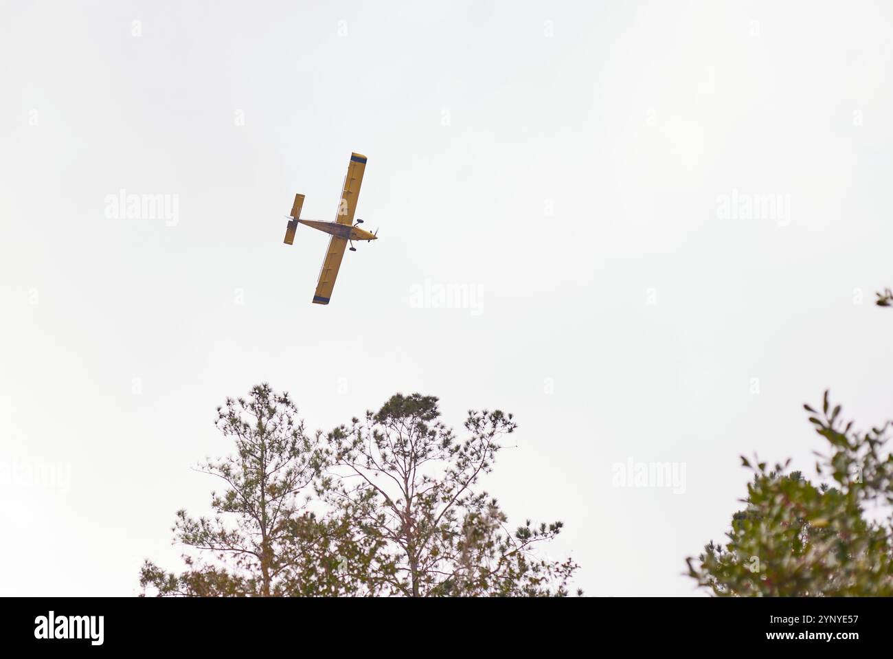 Aerial Tractor crop dusting farming acreage in rural southern Georgia ...