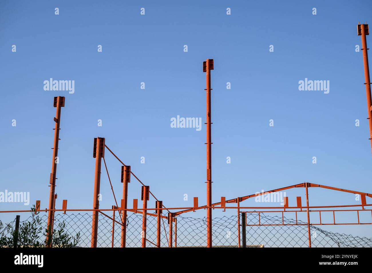 The red metal Structure of a large Industrial Building in the ...
