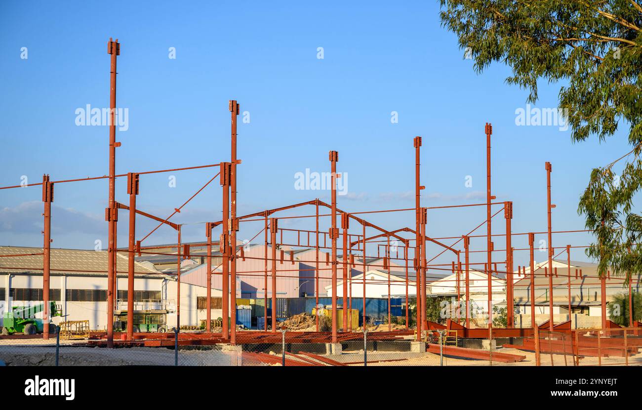 The red metal Structure of a large Industrial Building in the ...