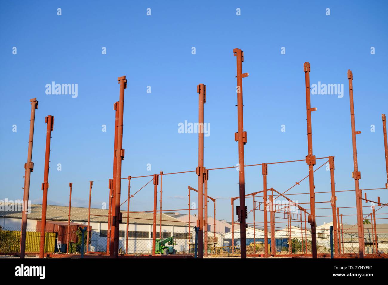 The red metal Structure of a large Industrial Building in the ...