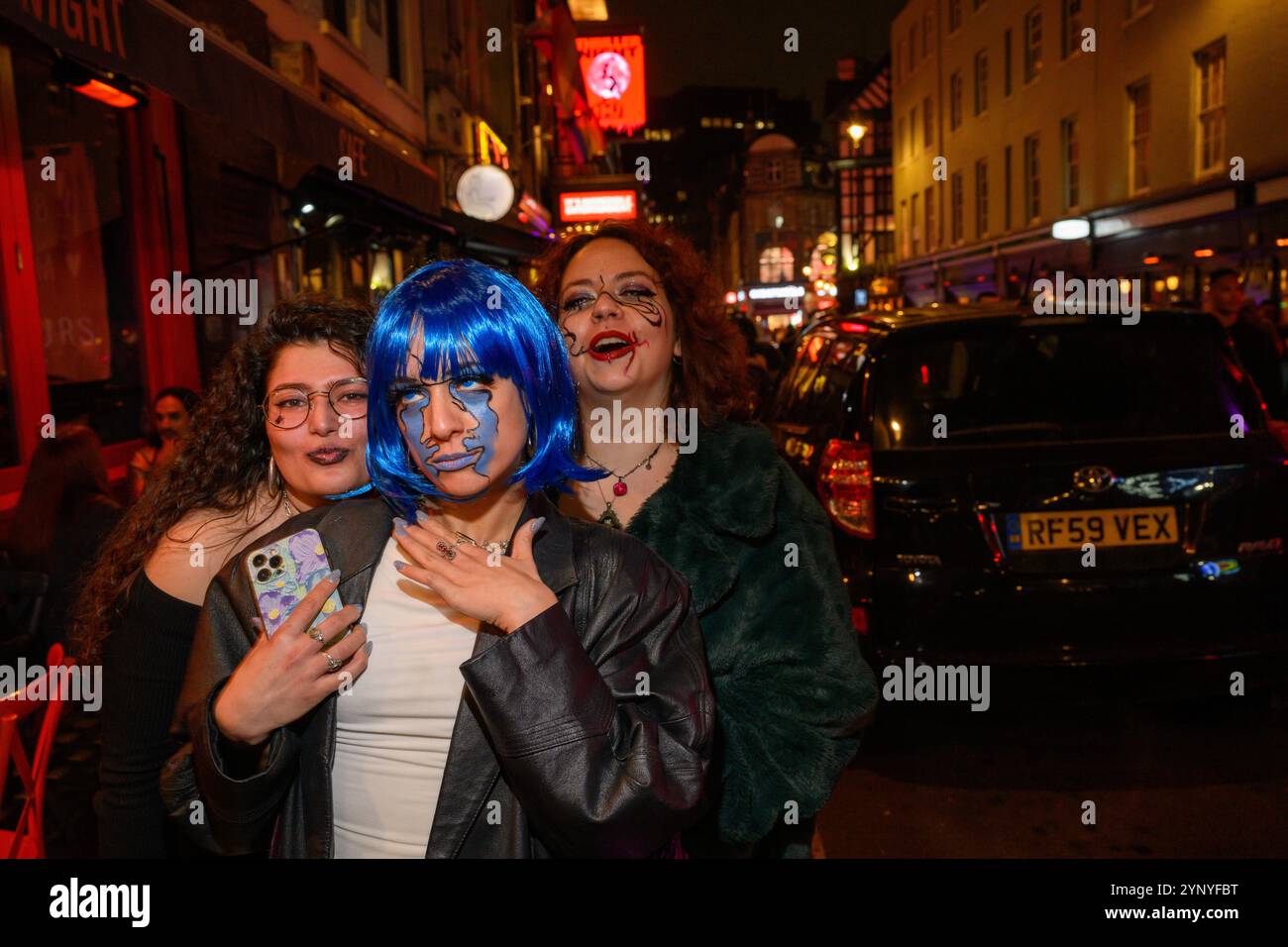 People in fancy dress celebrating, Halloween, Old Compton Street ...