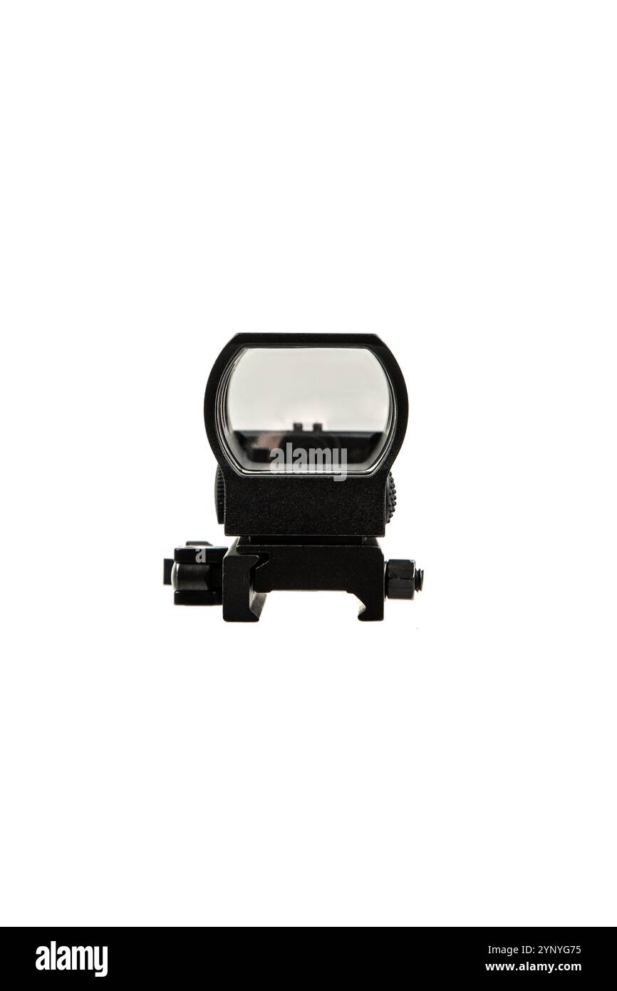 A black tactical reflex sight with adjustment knobs and a mounting base, designed for precision ...