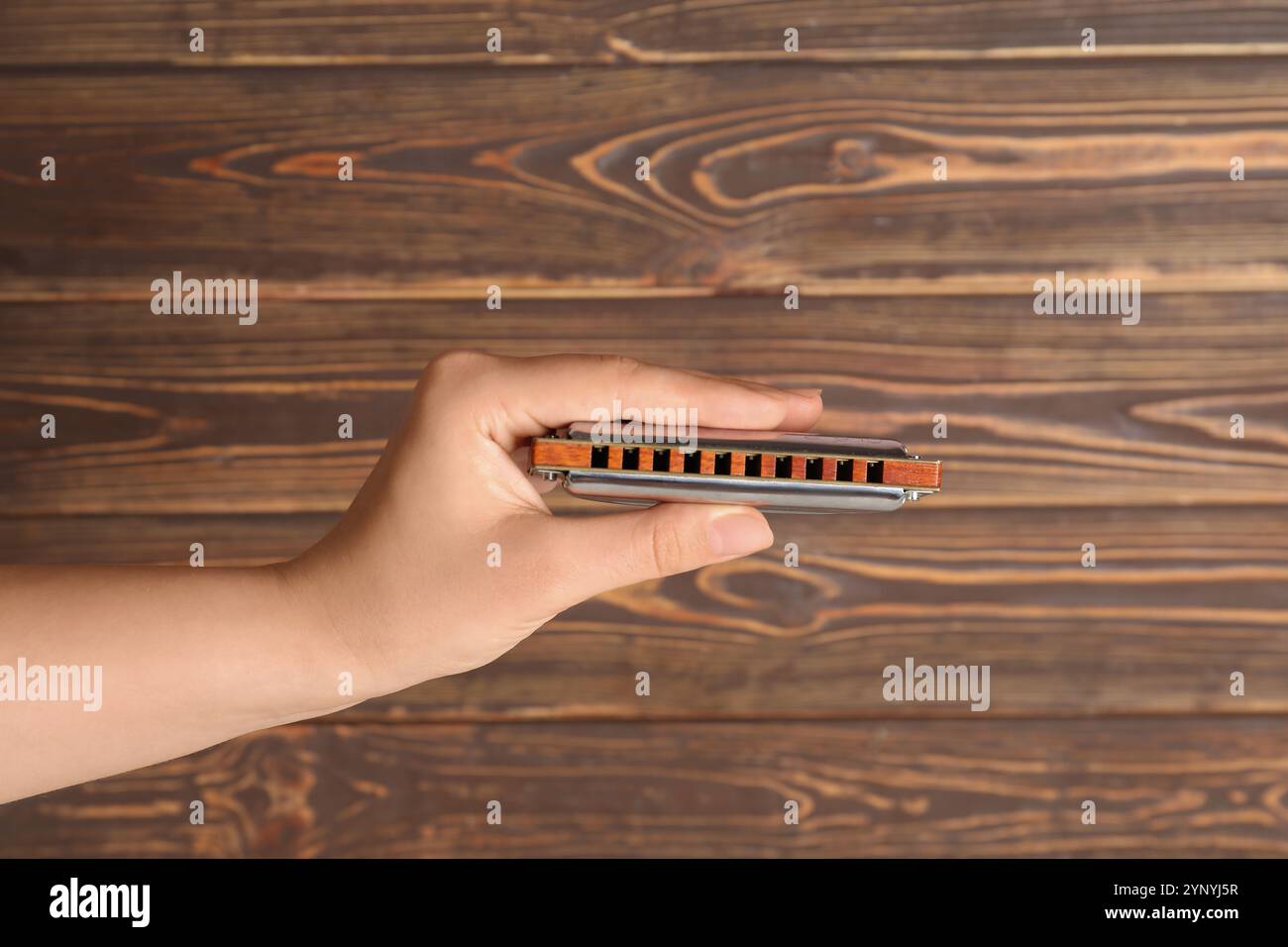 Female harmonica player hi-res stock photography and images - Alamy
