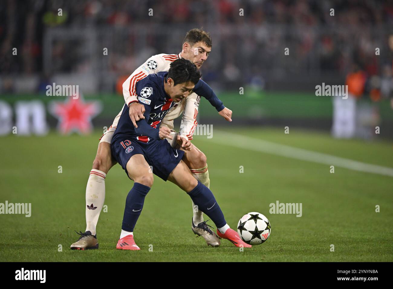 tackle, action, foul, Leon Goretzka FC Bayern Muenchen FCB (08) v Kang-in Lee FC Paris Saint ...