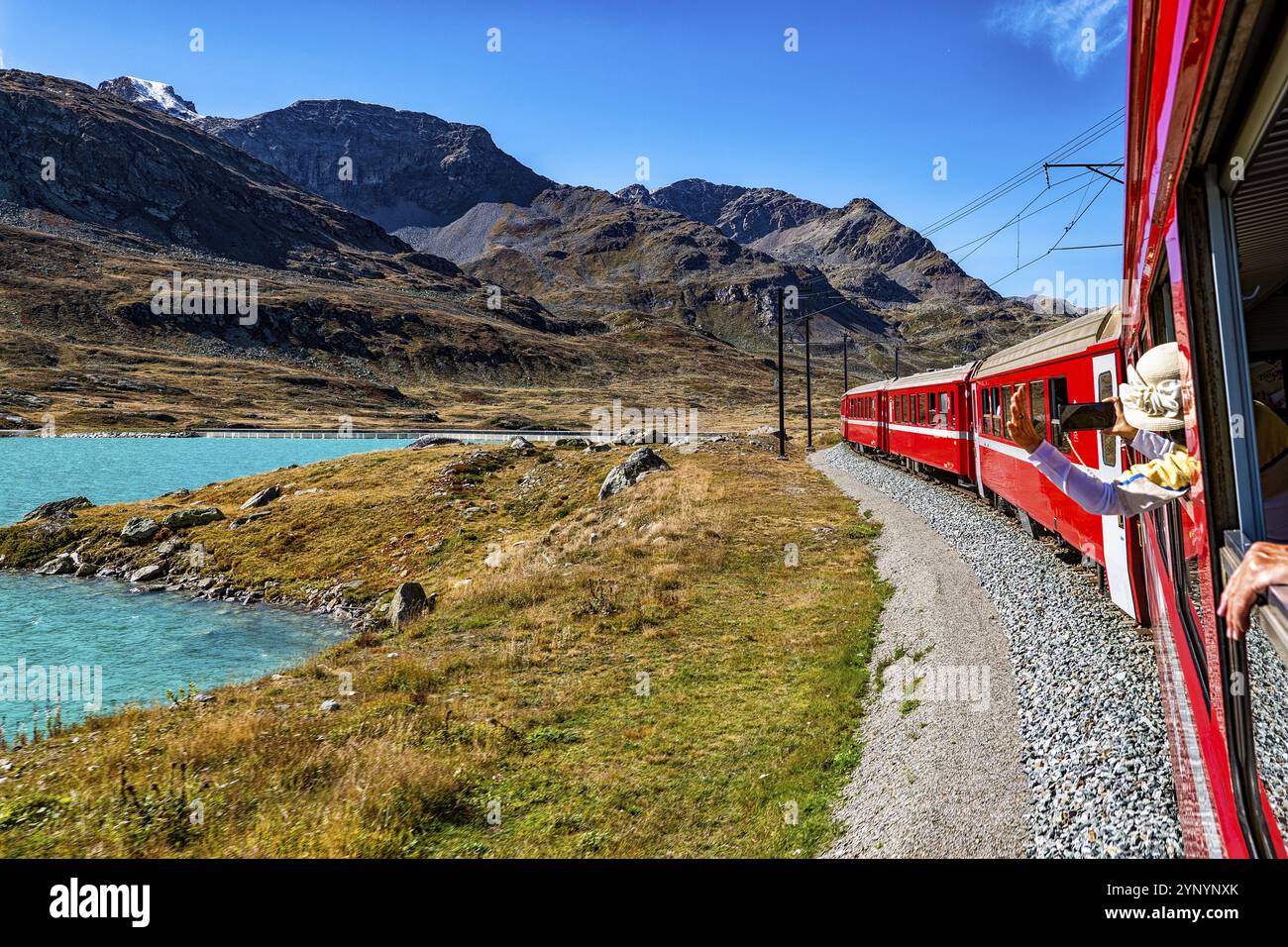 Red train of Bernina in the Swiss alps Stock Photo - Alamy