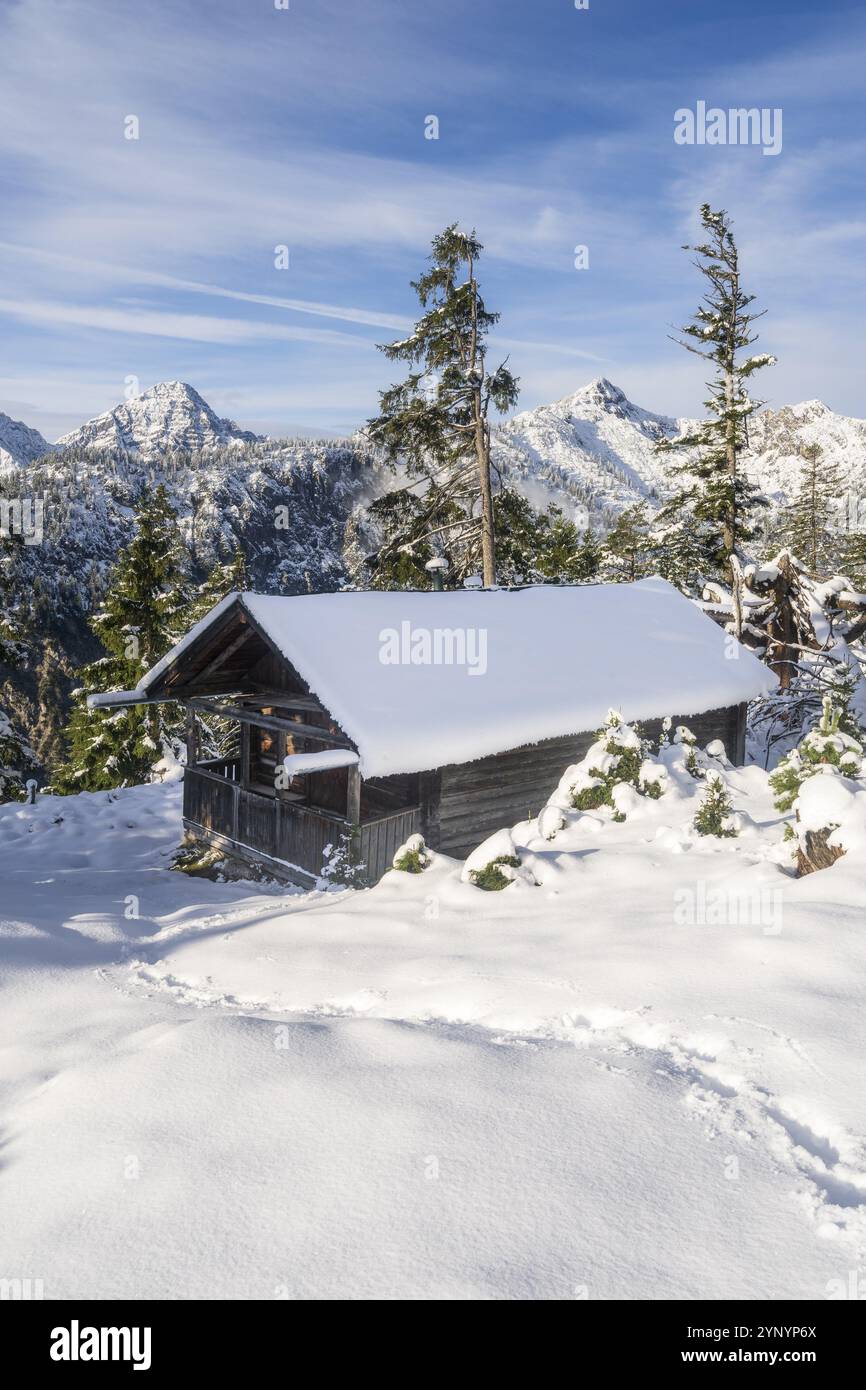 Mountain hut in deep snow near Plansee, Reutte, Tyrol, Austria, Europe ...