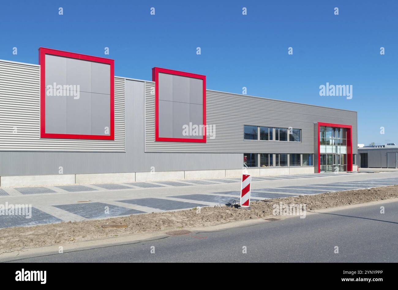 Newly build modern red office building with warehouse Stock Photo - Alamy