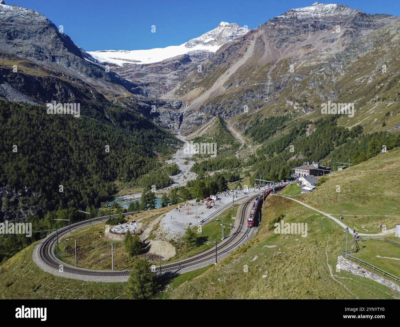Red train of Bernina in the Swiss alps Stock Photo - Alamy
