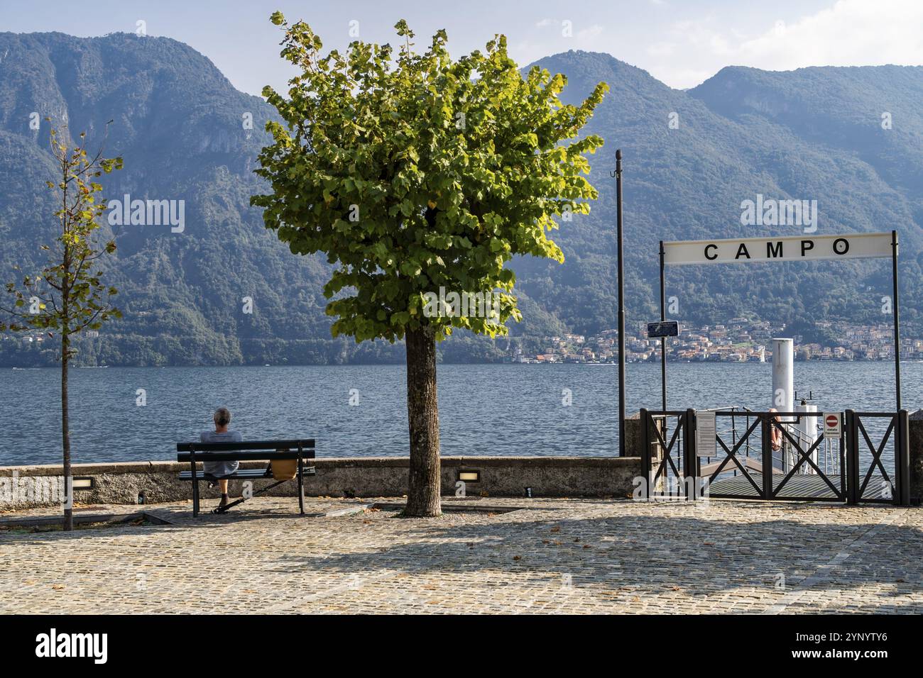 Ferry dock in a village of Lake Como (the write Campo is the name of ...