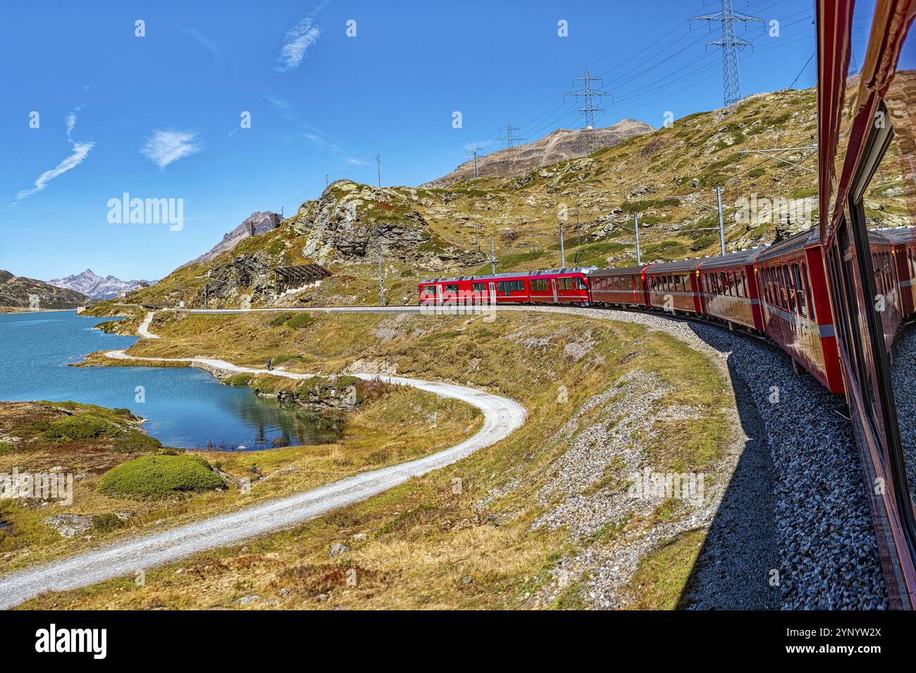 Red train of Bernina in the Swiss alps Stock Photo - Alamy
