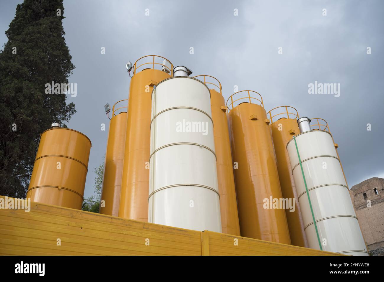 Yellow and white storage silos in the city center of rome Stock Photo ...