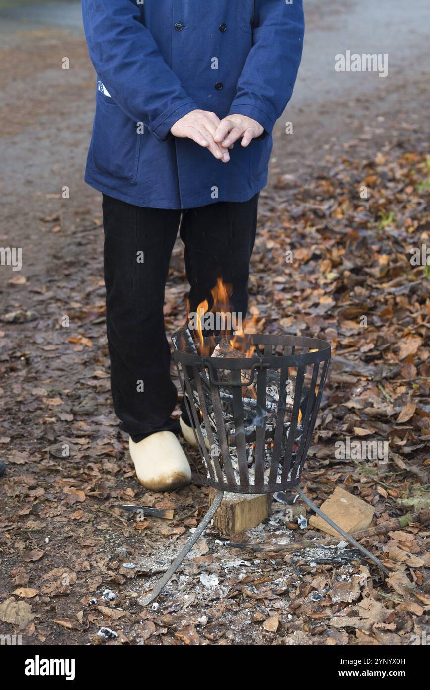 Warming hand over fire hi-res stock photography and images - Alamy