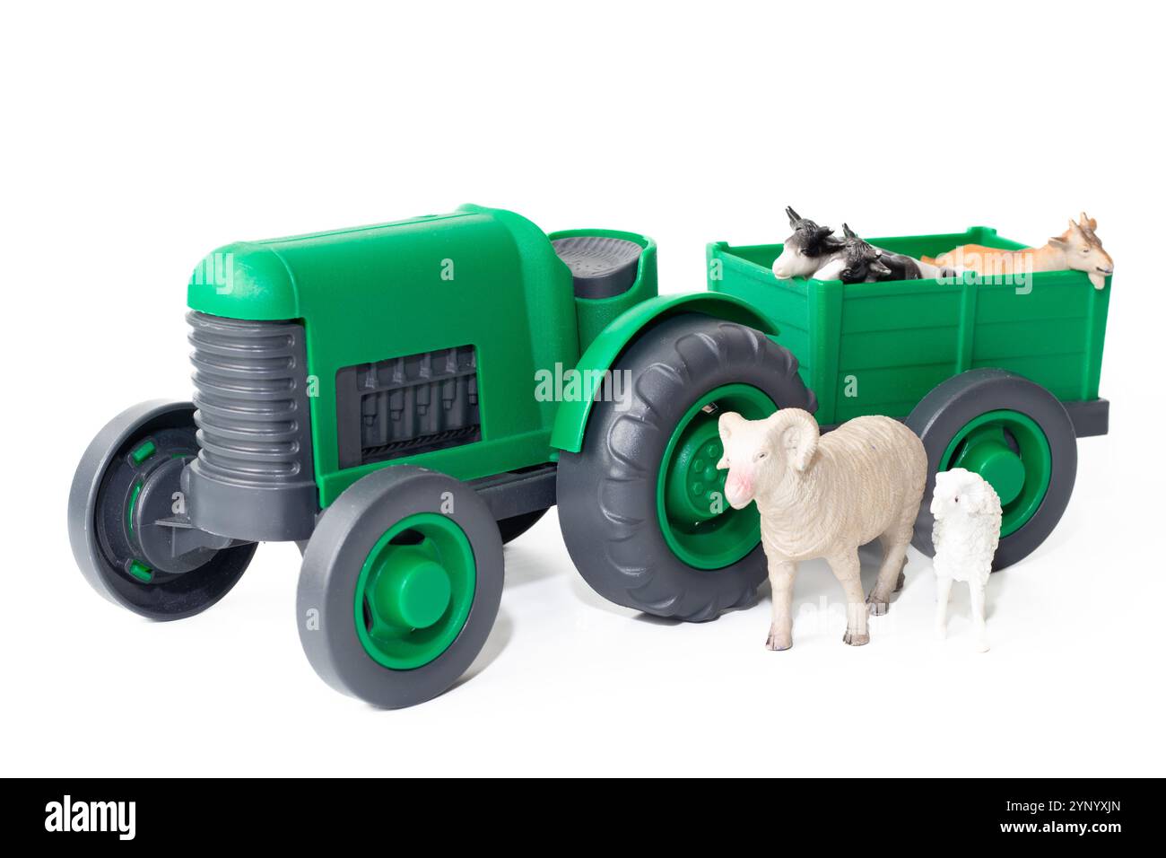 Trailer tractor and farm animals. Toy for children. Green toy tractor ...